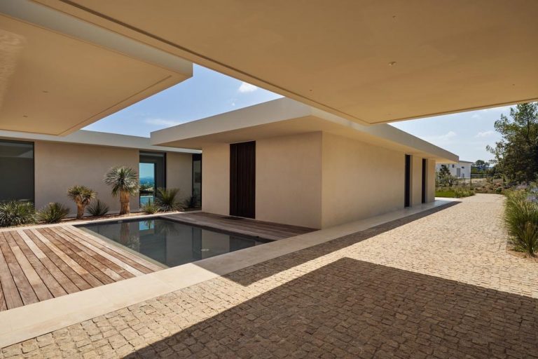 French Hillside Country House with Flat Roofs and Glazed Walkways