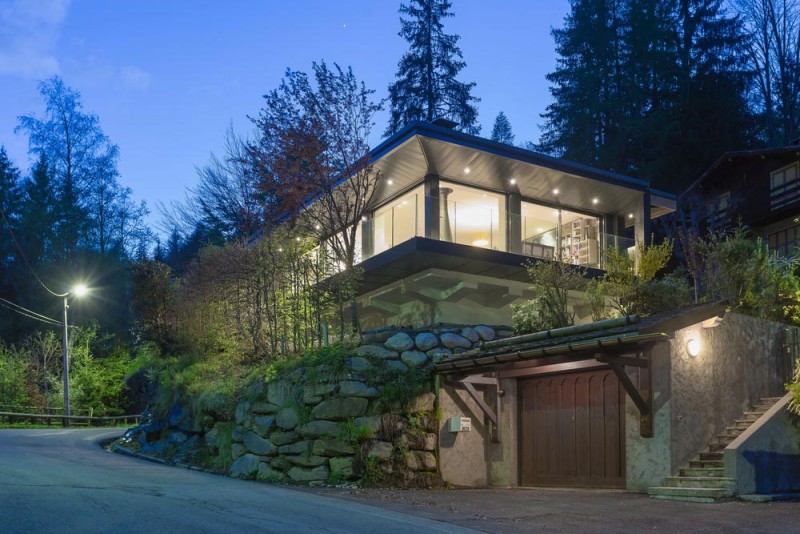 Modern French mountain chalet wrapped in glass and views